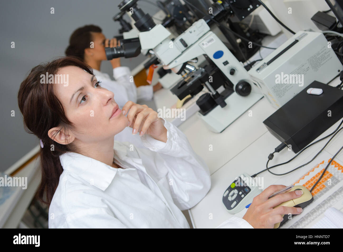 Microscopes researcher hi-res stock photography and images - Alamy