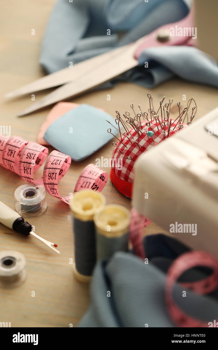 Sewing tools on the table Stock Photo - Alamy