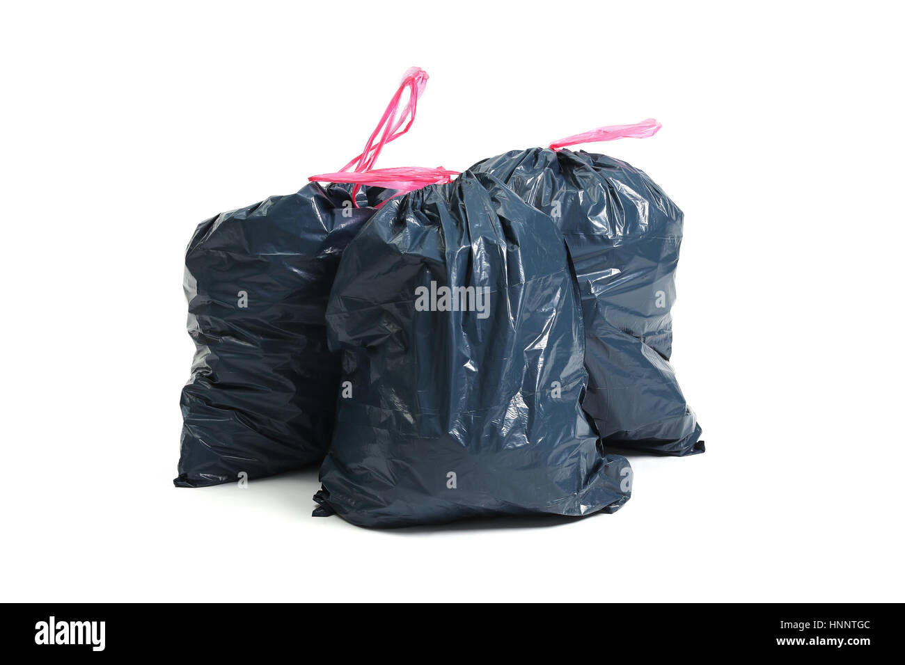 Pollution. Trash bags on a white background Stock Photo - Alamy