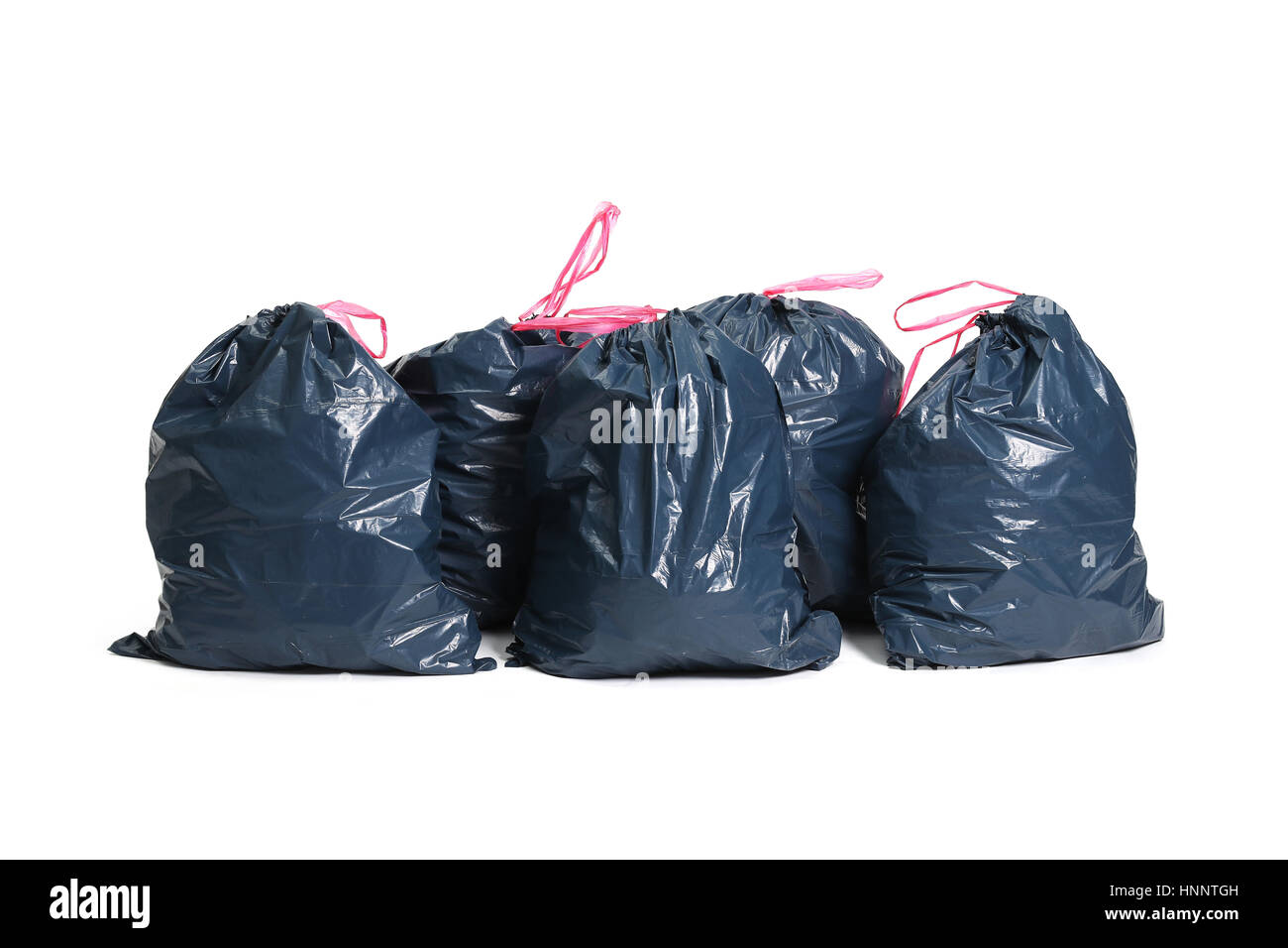 Pollution. Trash bags on a white background Stock Photo - Alamy