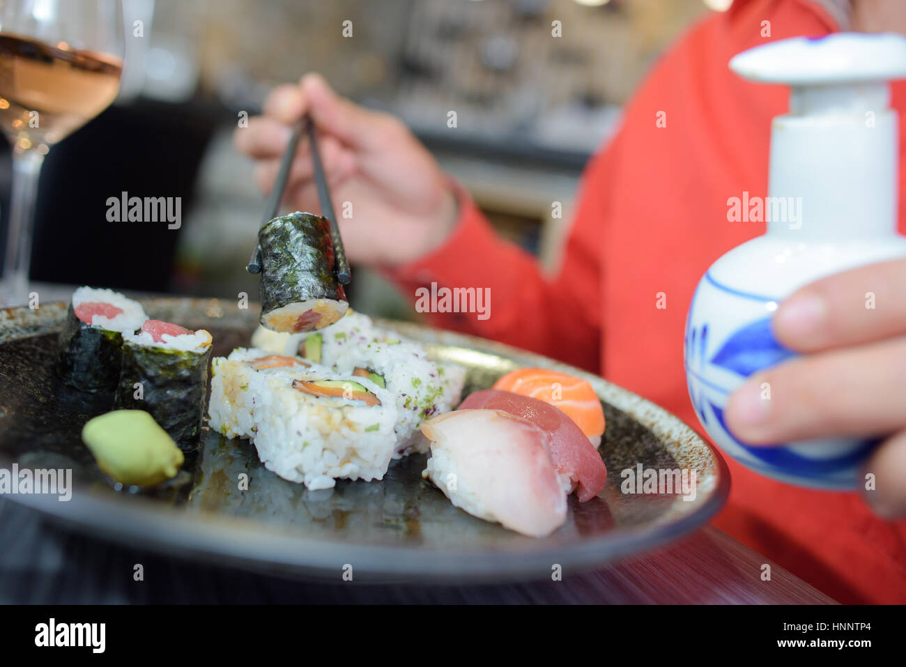 eating some sushi Stock Photo - Alamy