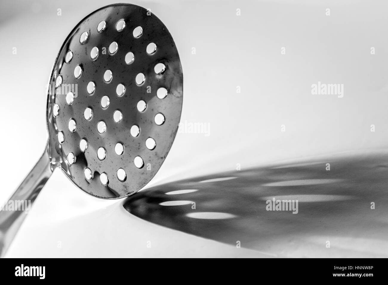 Cast black and white spoon Black and White Stock Photos & Images - Alamy