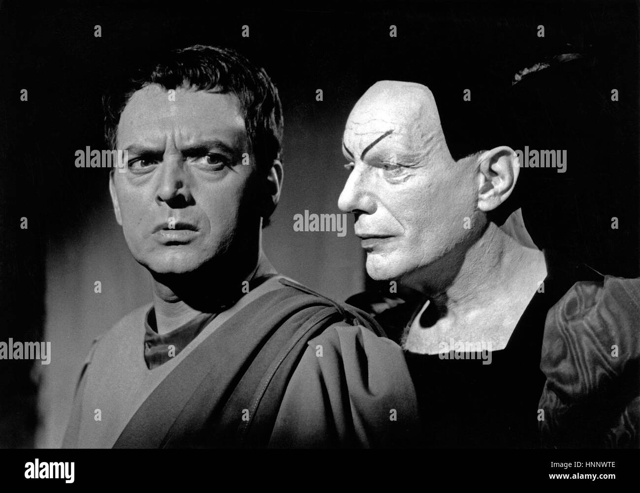 Whispering devil hi-res stock photography and images - Alamy