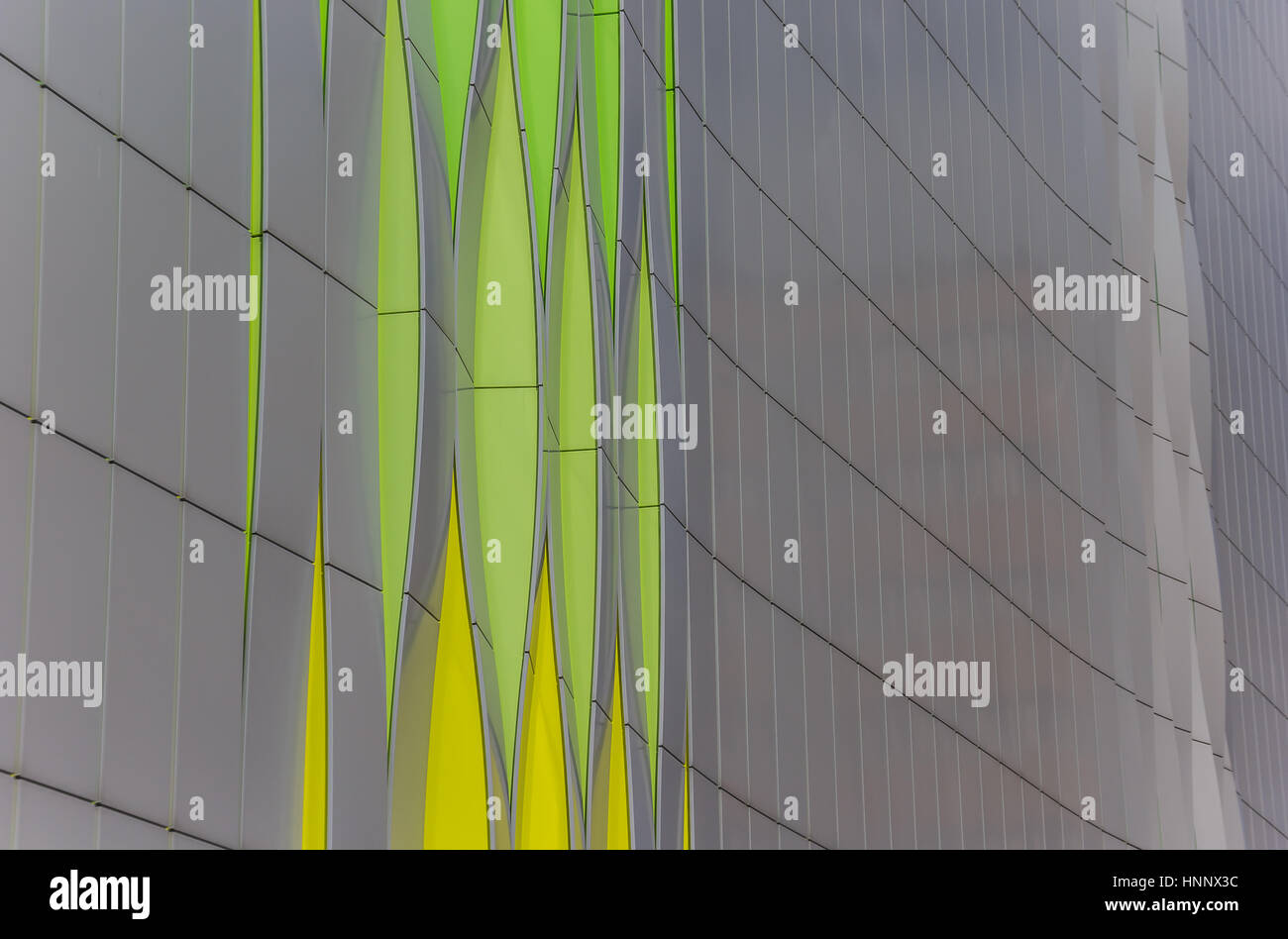Colorful architecture with curves in silver, yellow and green Stock ...