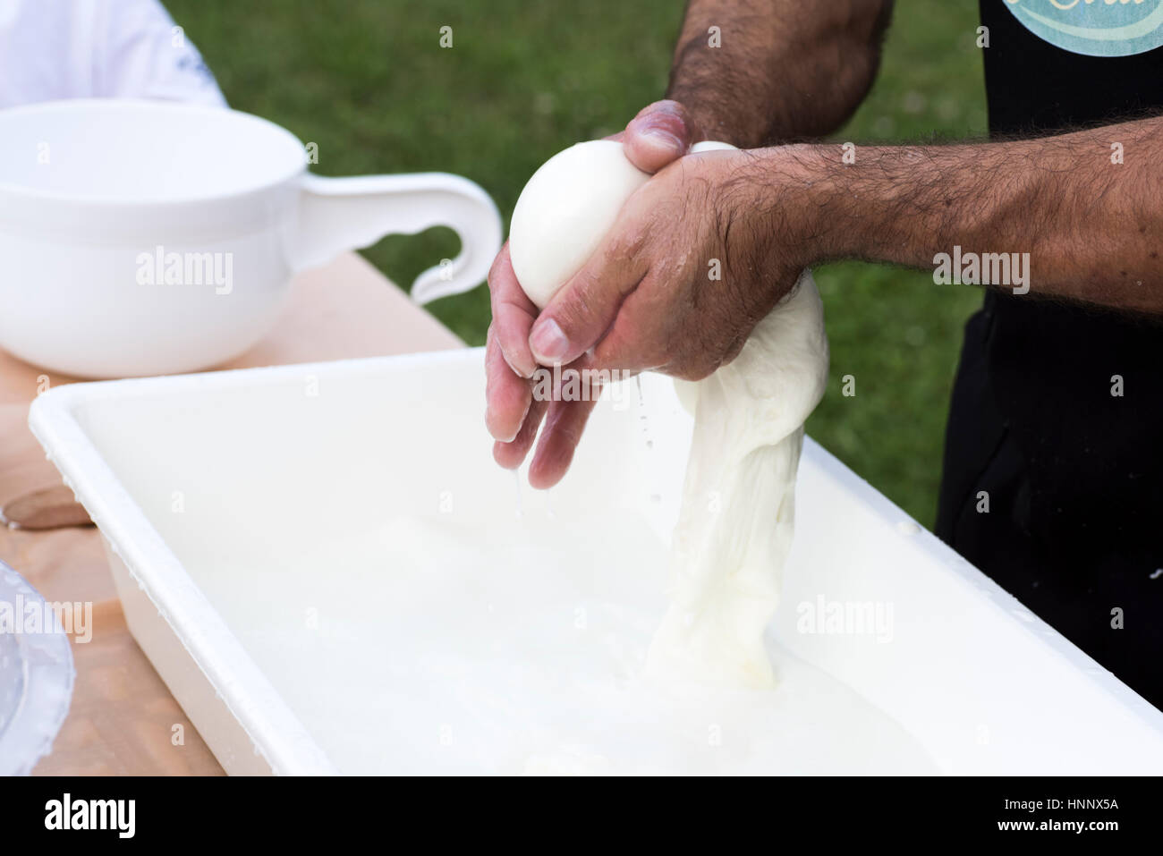 processing of mozzarella in the traditional way Stock Photo - Alamy