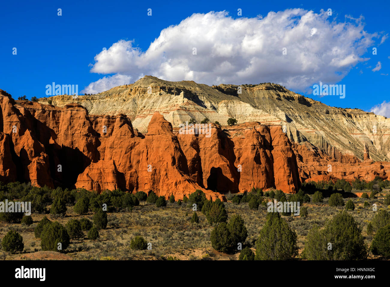 This is a view of the red rock and tan-colored sandstone mountains on ...