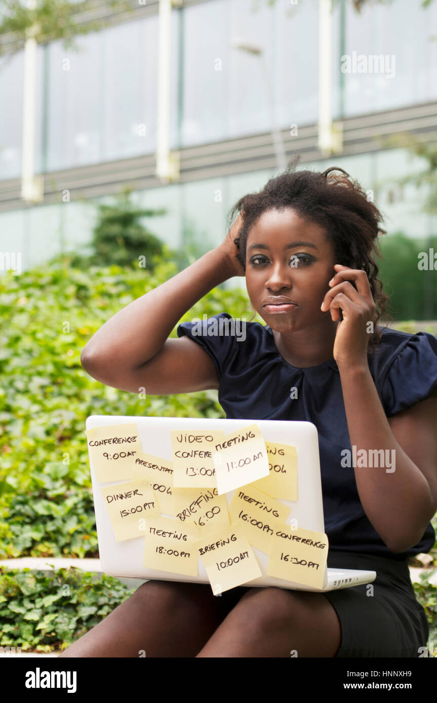 stressed woman with computer Stock Photo - Alamy