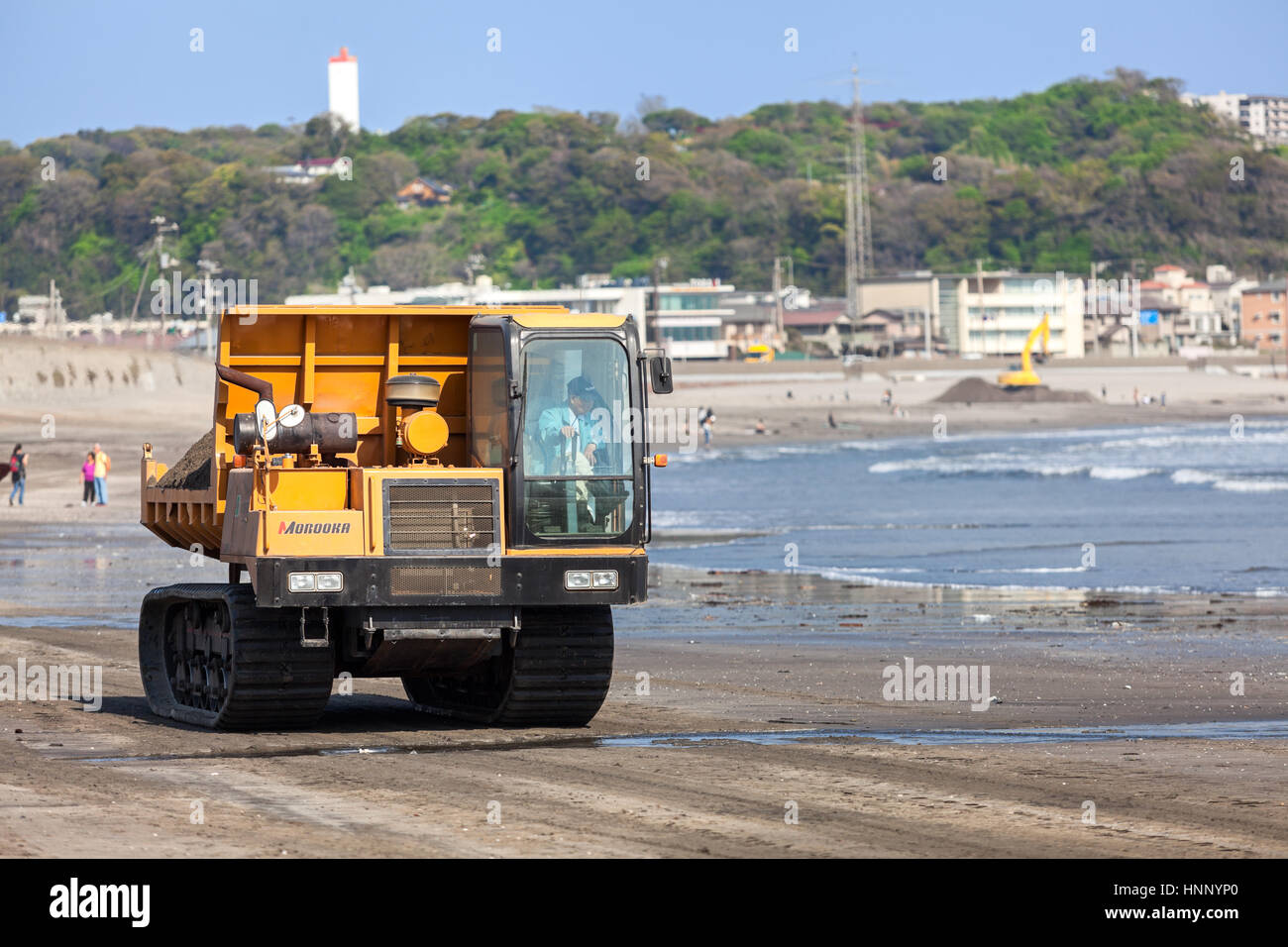 KAMAKURA, JAPAN - CIRCA APR, 2013: Crawler transporter full of sand ...