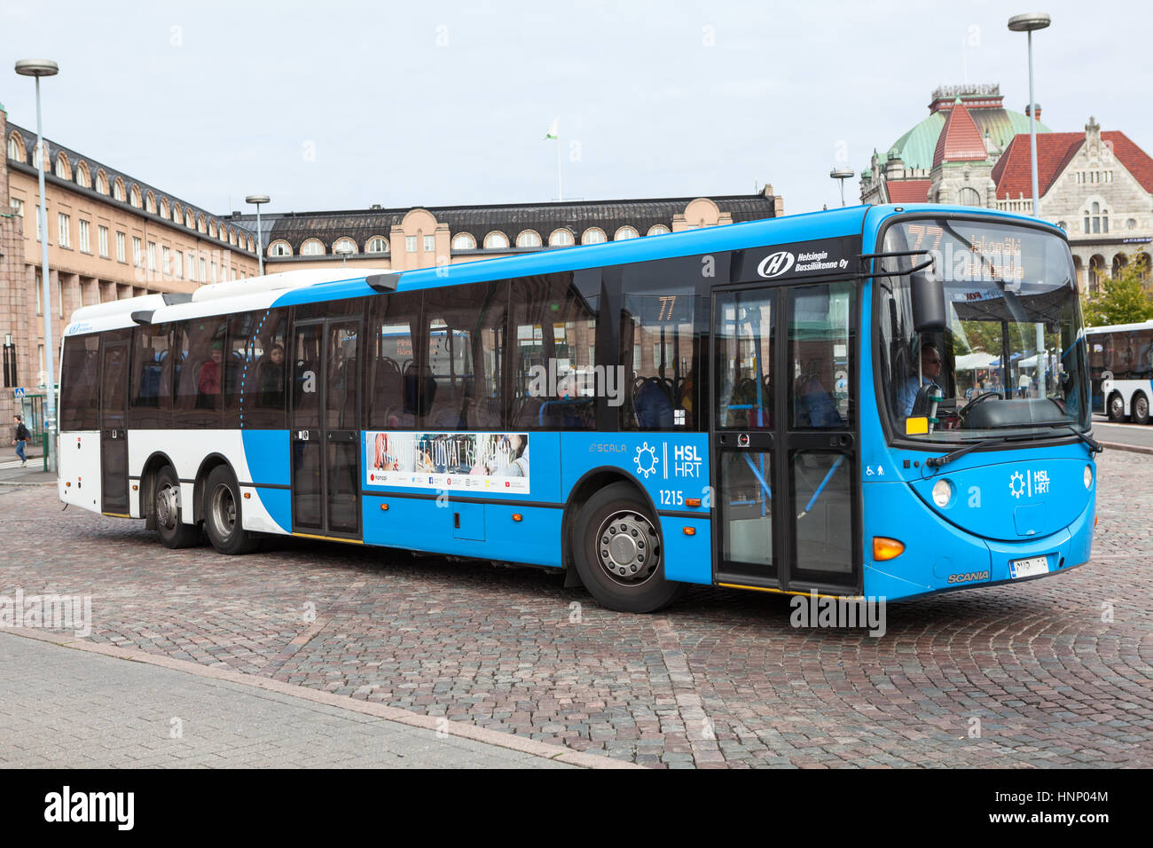 HELSINKI, FINLAND - CIRCA SEP, 2016: Blue passenger public bus drives ...