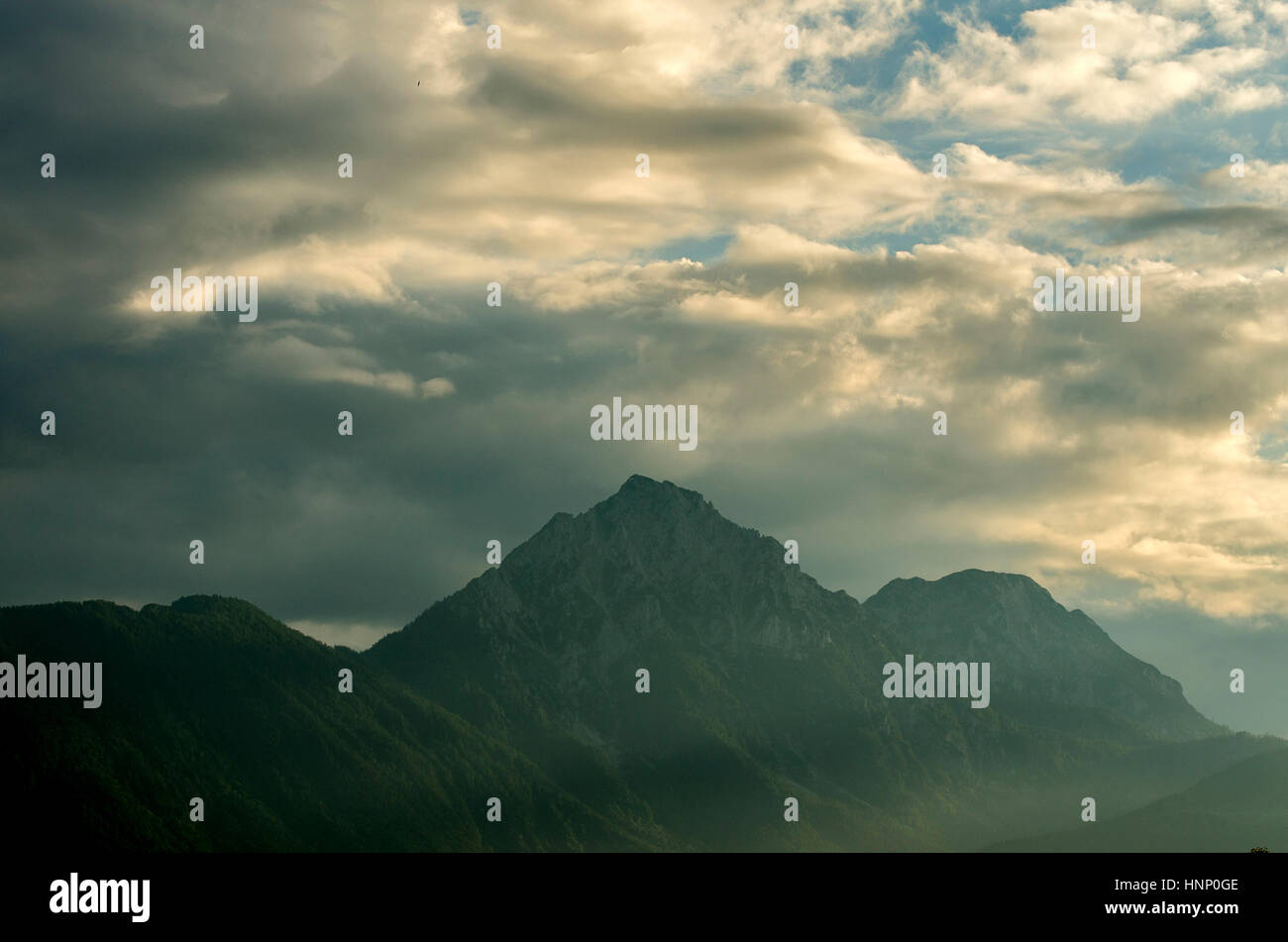 CLoudy evening sky at the mountains of the Austrian Alps Stock Photo ...