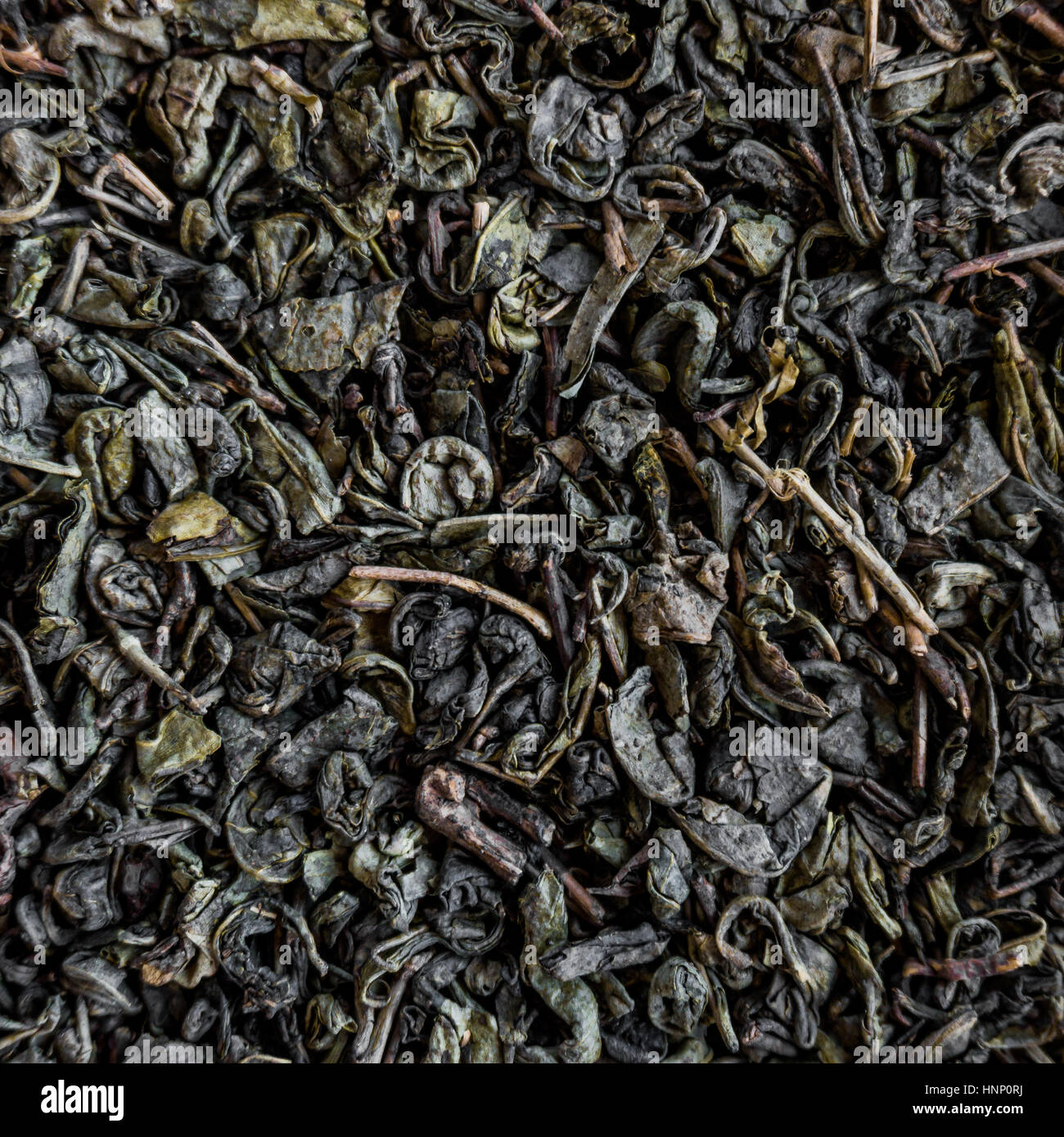 Black tea background. Heap of dry black tea Stock Photo - Alamy