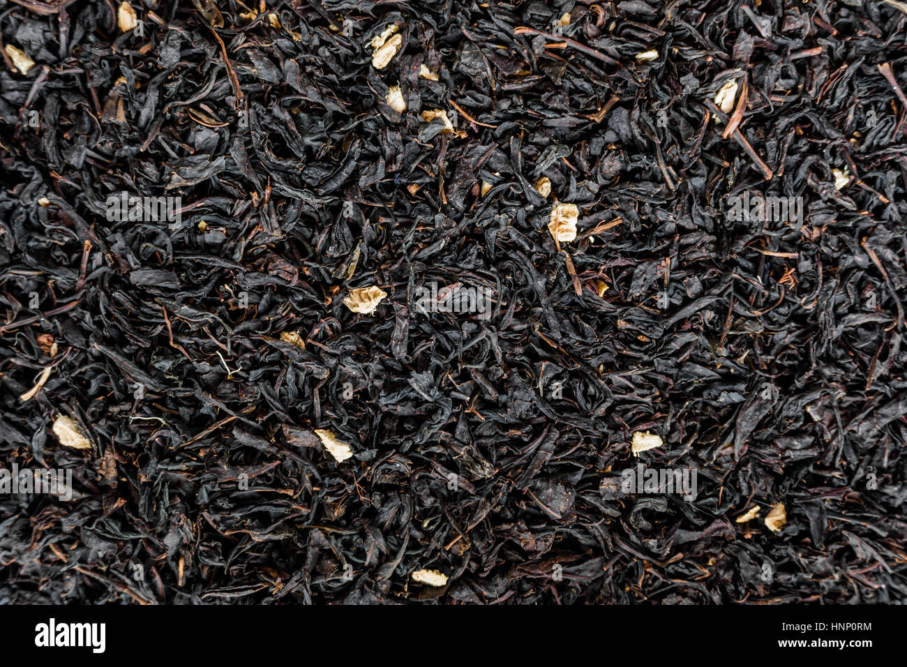 Black tea background. Heap of dry black tea Stock Photo - Alamy