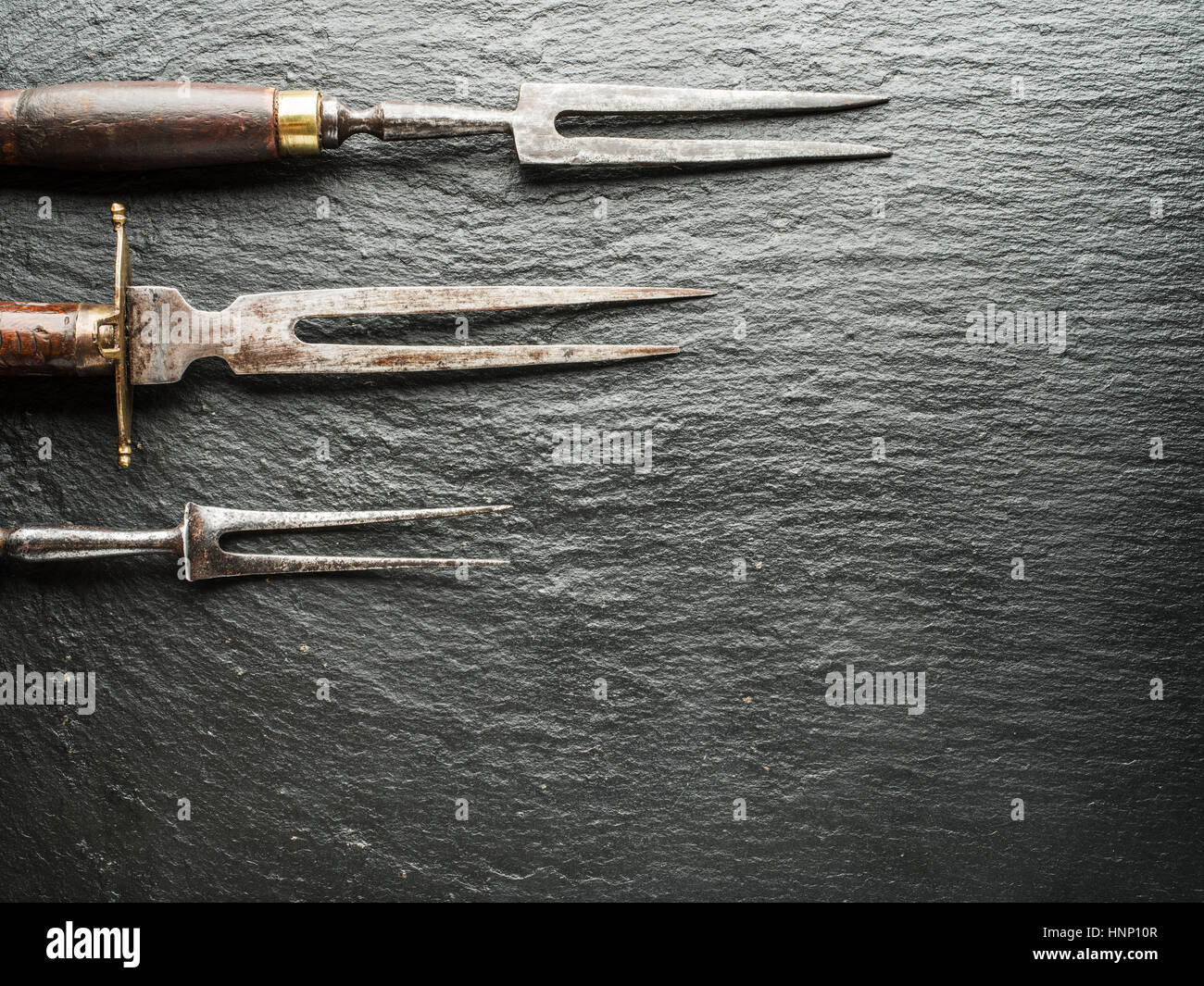 Kitchen utensils on the graphite background Stock Photo - Alamy