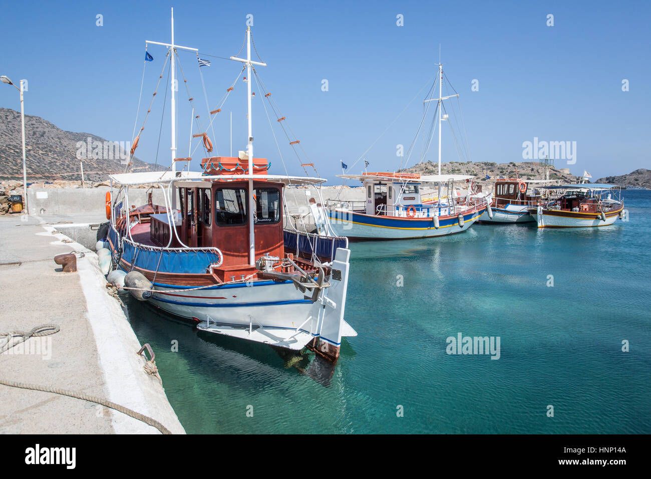 Fishing boats on the Elounda coast of The Crete Stock Photo - Alamy