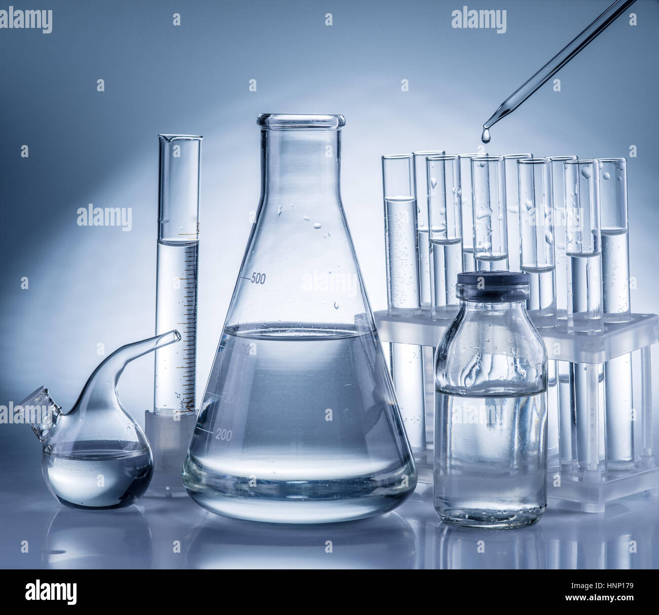 Different laboratory beakers and glassware. Monochrome Stock Photo - Alamy