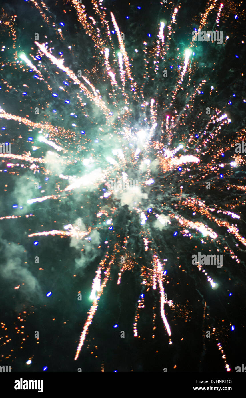 Bright firework explosions on the night sky Stock Photo - Alamy