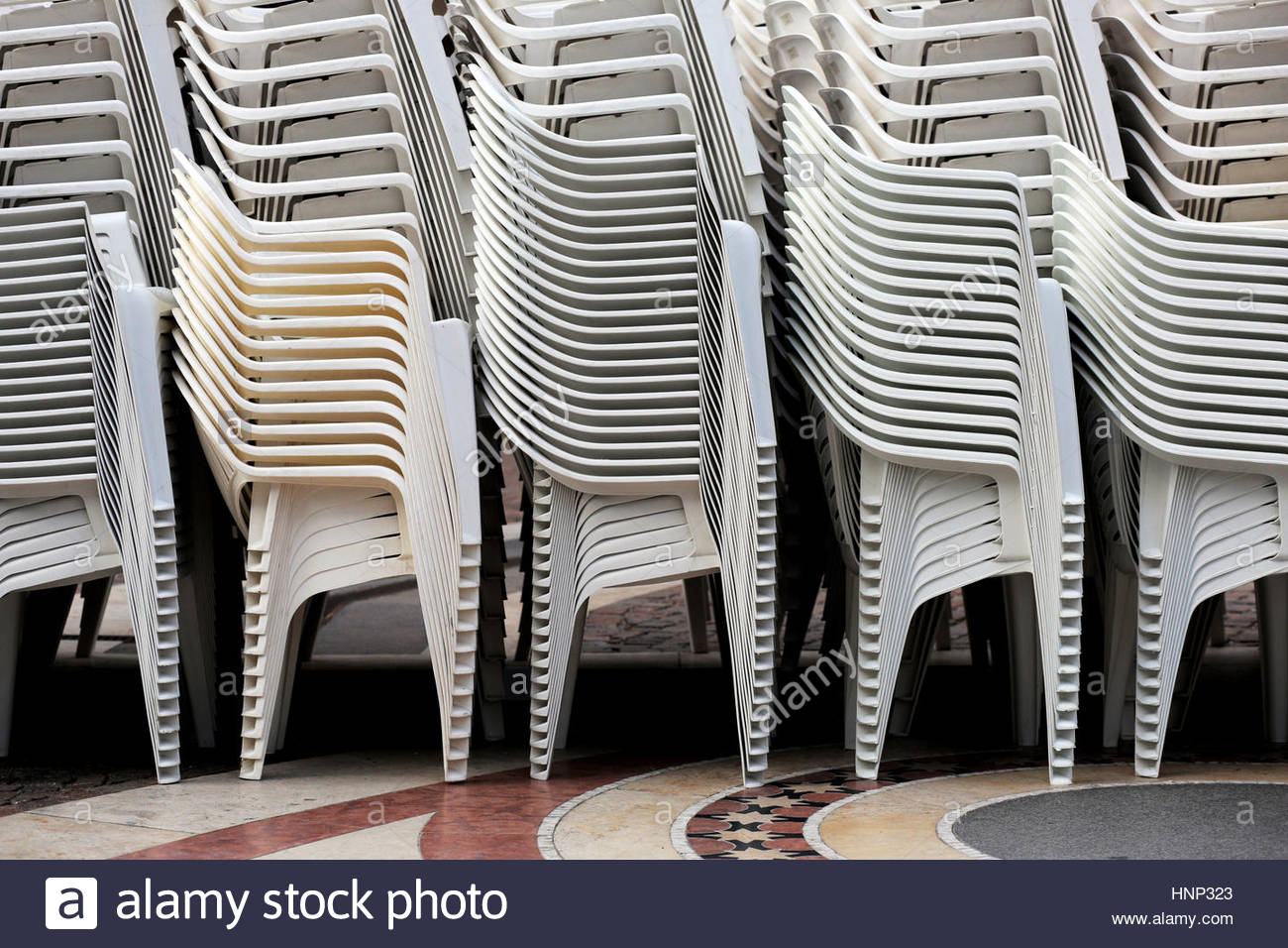 Stacking chairs repetition hi-res stock photography and images - Alamy