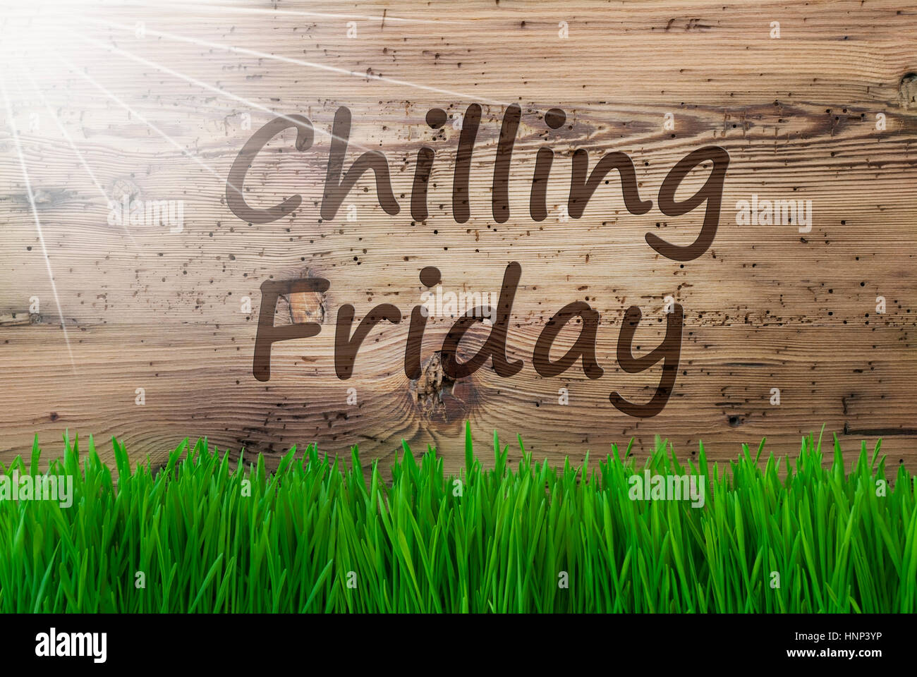 Sunny Wooden Background, Gras, Text Chilling Friday Stock Photo - Alamy