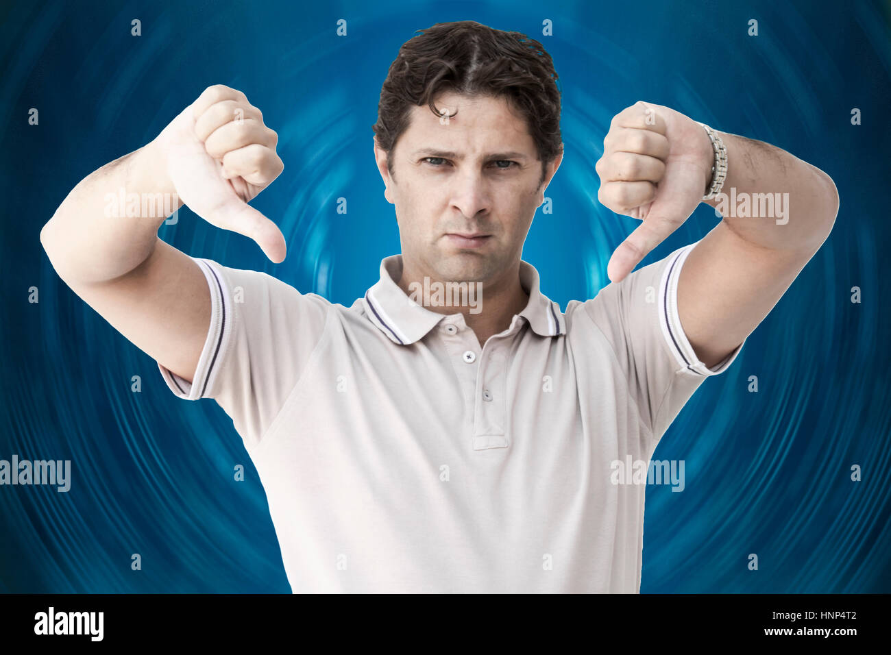 Man showing both thumbs down Stock Photo - Alamy