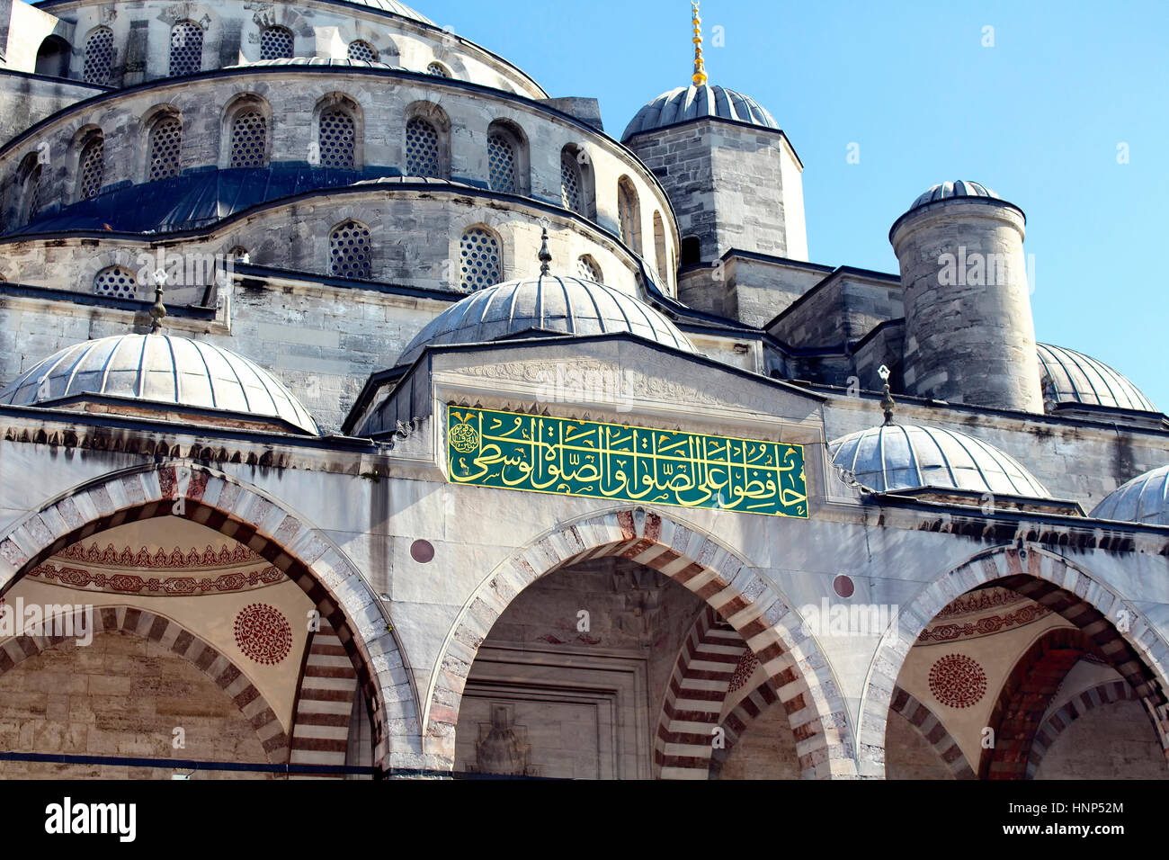 Bottom view of Blue (Sultanahmet) Mosque with blue clear sky in the ...