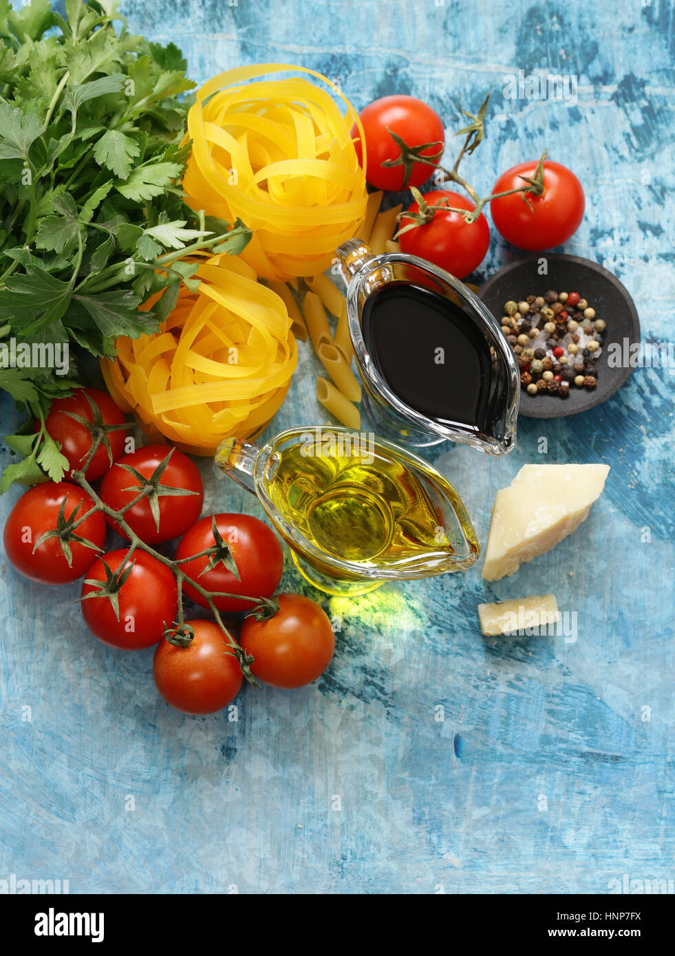 Italian food ingredients - vegetables, olive oil, spices and pasta ...