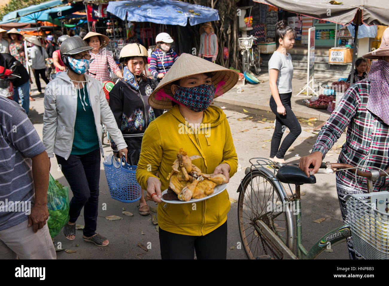 Carrying a chicken to market, Hoi An, Vietnam Stock Photo - Alamy