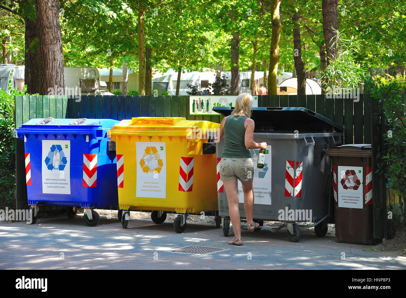 Woman disposing garbage hi-res stock photography and images - Alamy
