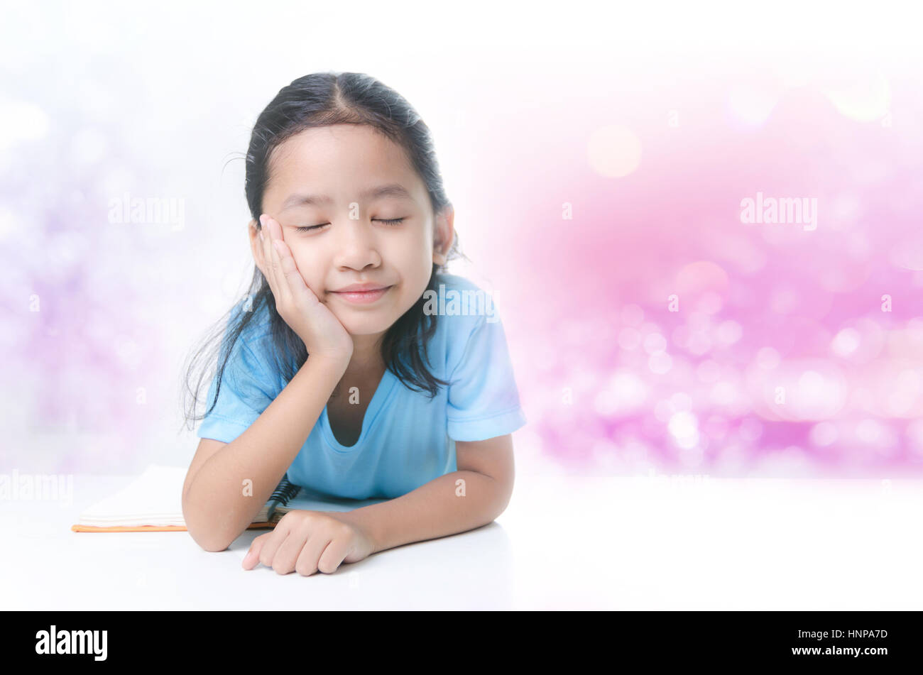 Close up shot portrait of smile Asian little girl close her eyes and ... Close up shot portrait of smile Asian little girl close her eyes and ...
