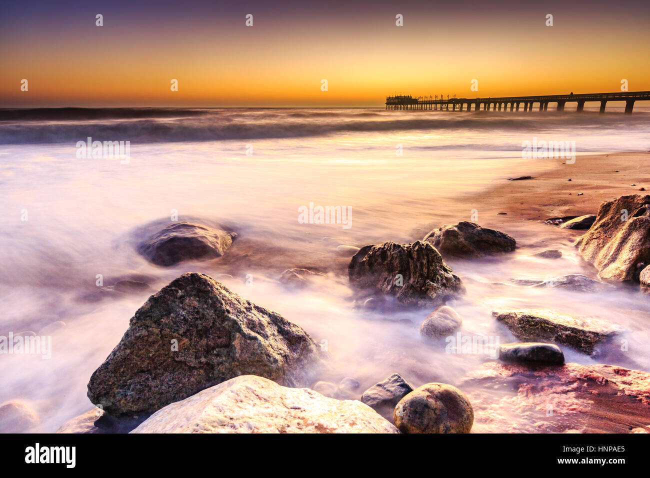 Beach at a former pier, jetty at sunset, Atlantic, Swakopmund, Erongo ...