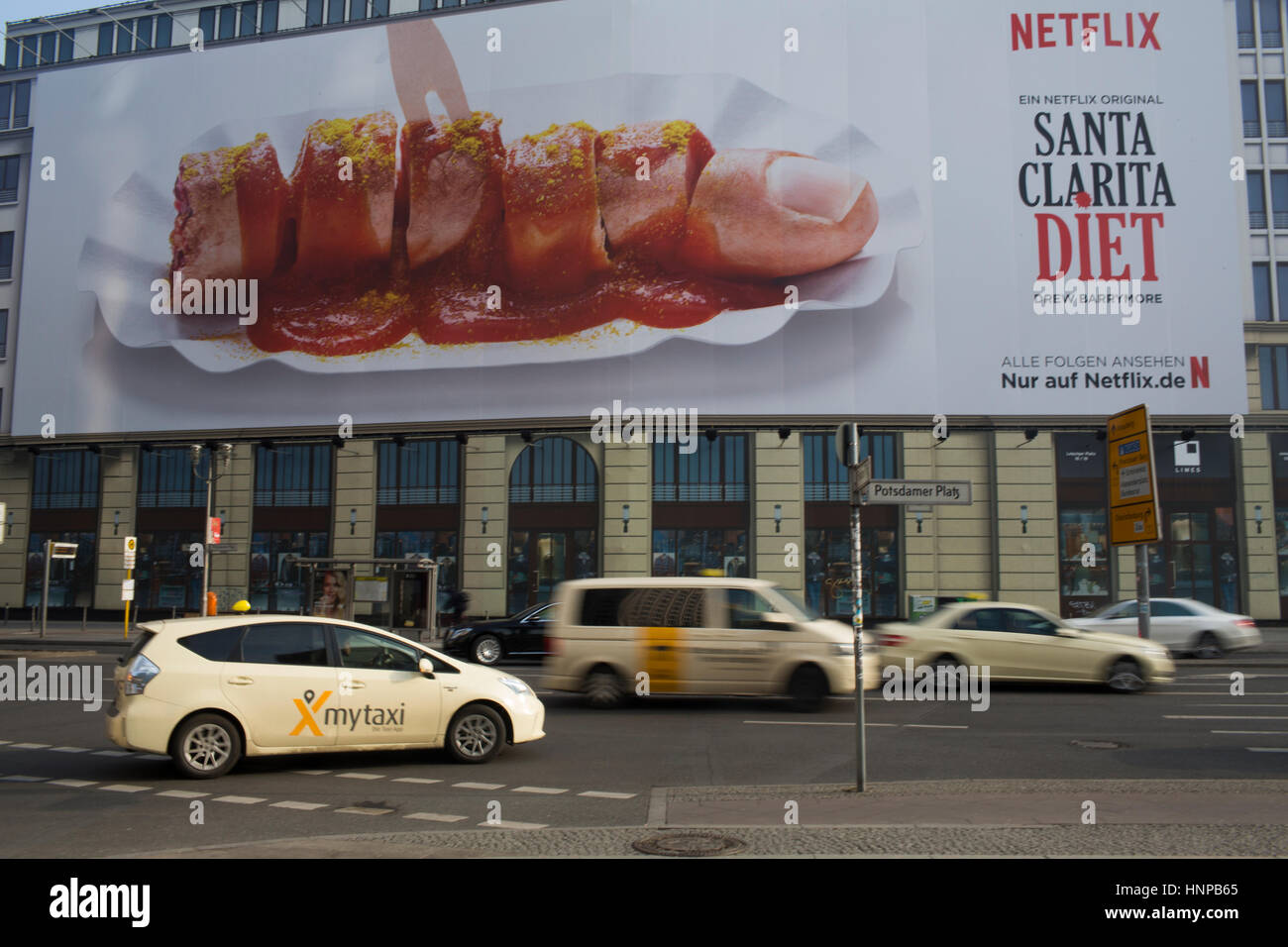 billboard commercial of netflix series in Berlin Stock Photo - Alamy