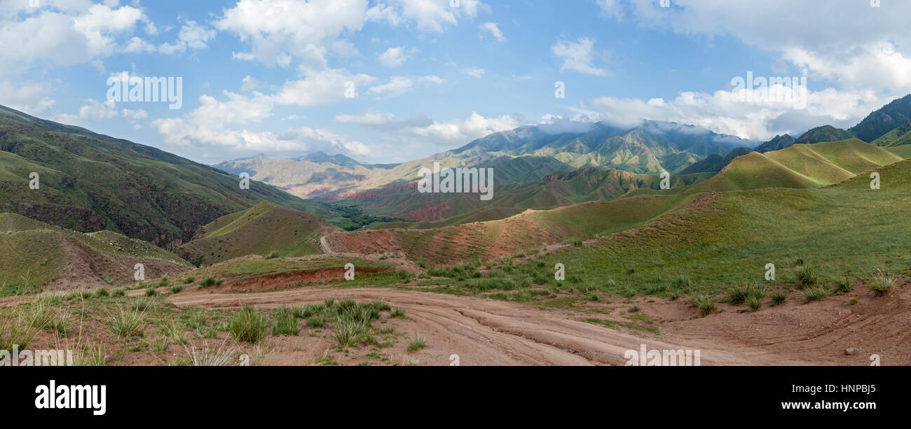Steppe Kazakhstan, Trans-Ili Alatau, plateau Assy, a road is in ...