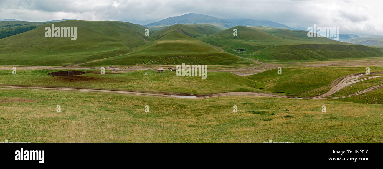 Steppe Kazakhstan, Trans-Ili Alatau, plateau Assy, a road is in ...