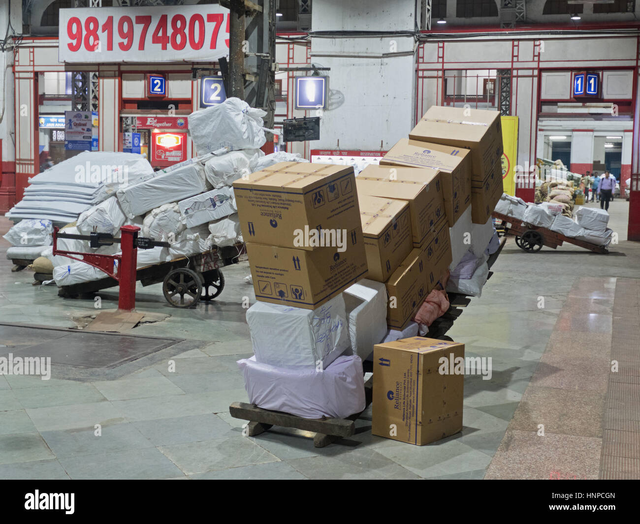 Cargo stacked in a holding area in the eraly hours on Victoria rail ...