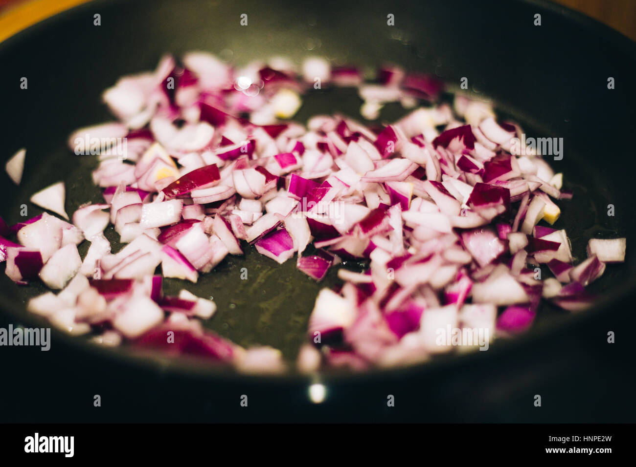 Frying saute vegetables in pan hi-res stock photography and images - Alamy