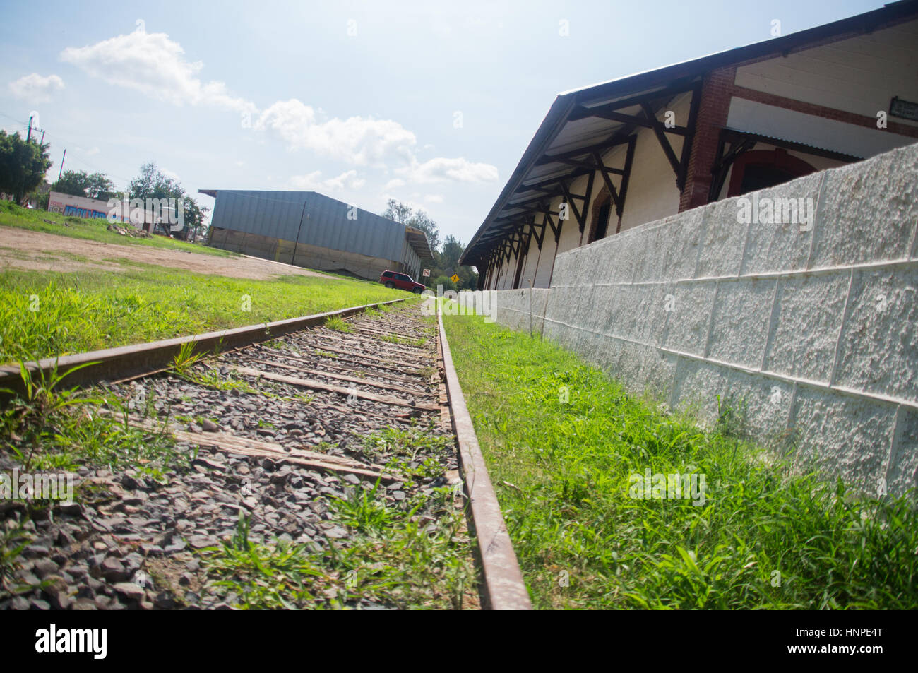 A low point of view of a urban train tracks Stock Photo - Alamy