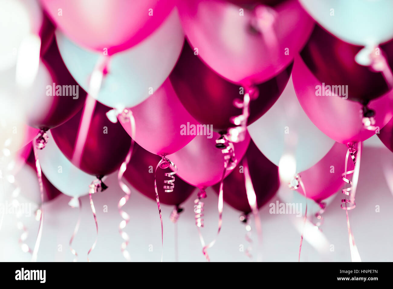 Pink air balloons golden hi-res stock photography and images - Alamy