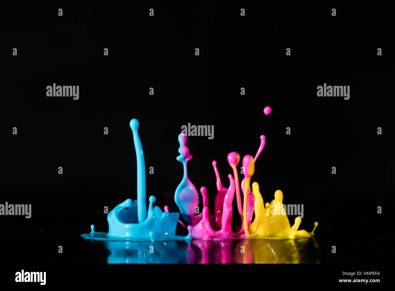 Аbstract sculptures of colorful splashes of paint. Dancing liquid on a ...