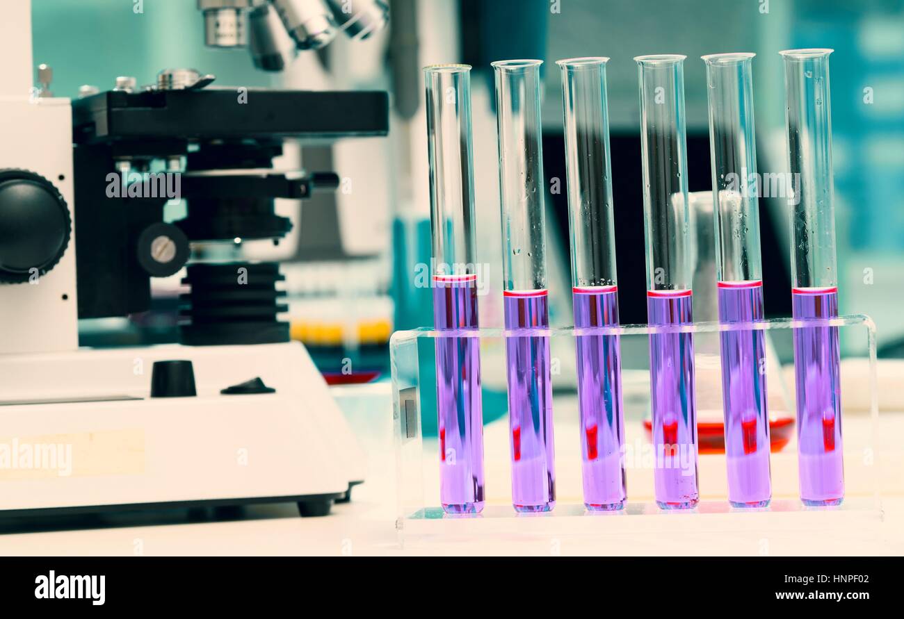 Science laboratory with a microscope, biological material samples and a ...