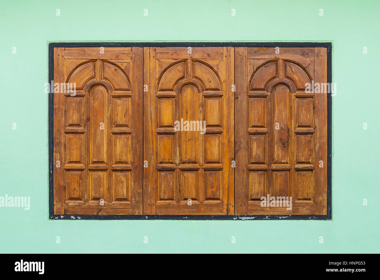Old Teak Wood Window on Green Wall Stock Photo - Alamy