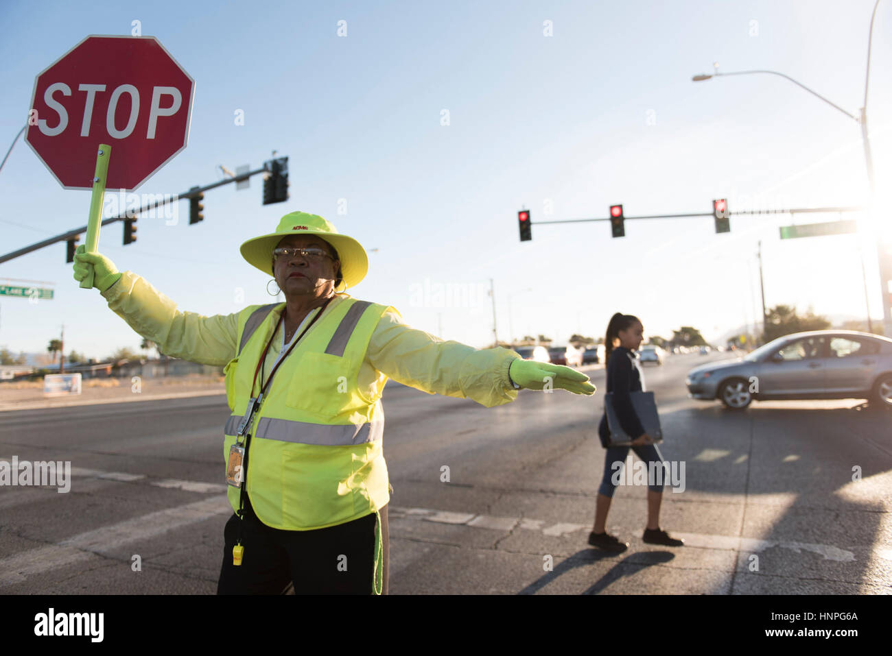 Children crossing street guard hi-res stock photography and images - Alamy