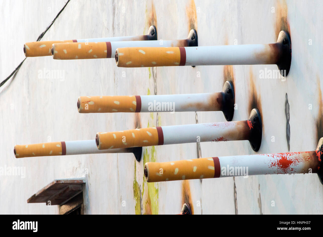 Cigarette wall sculpture, Georgetown, Penang, Malaysia Stock Photo - Alamy