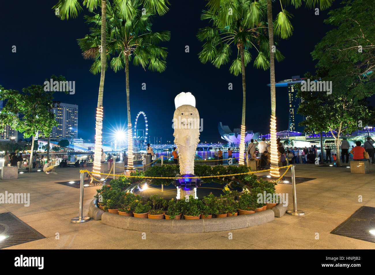 Merlion Park promenade at night, Singapore, July 15, 2013 Stock Photo ...
