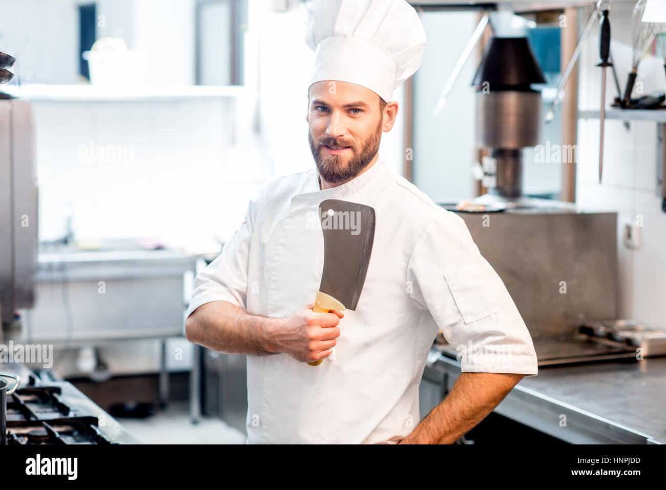 Cook in uniform hi-res stock photography and images - Alamy
