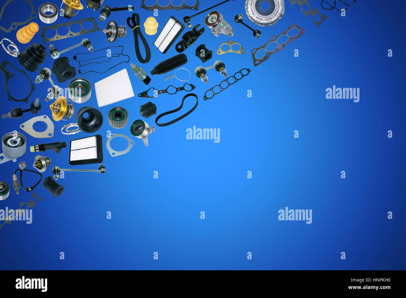 Spare parts car on the blue background Stock Photo - Alamy