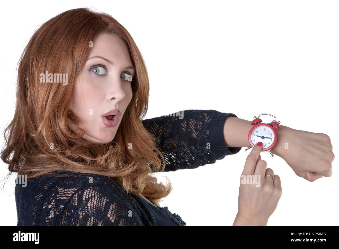 woman looking at her watch running late Stock Photo - Alamy