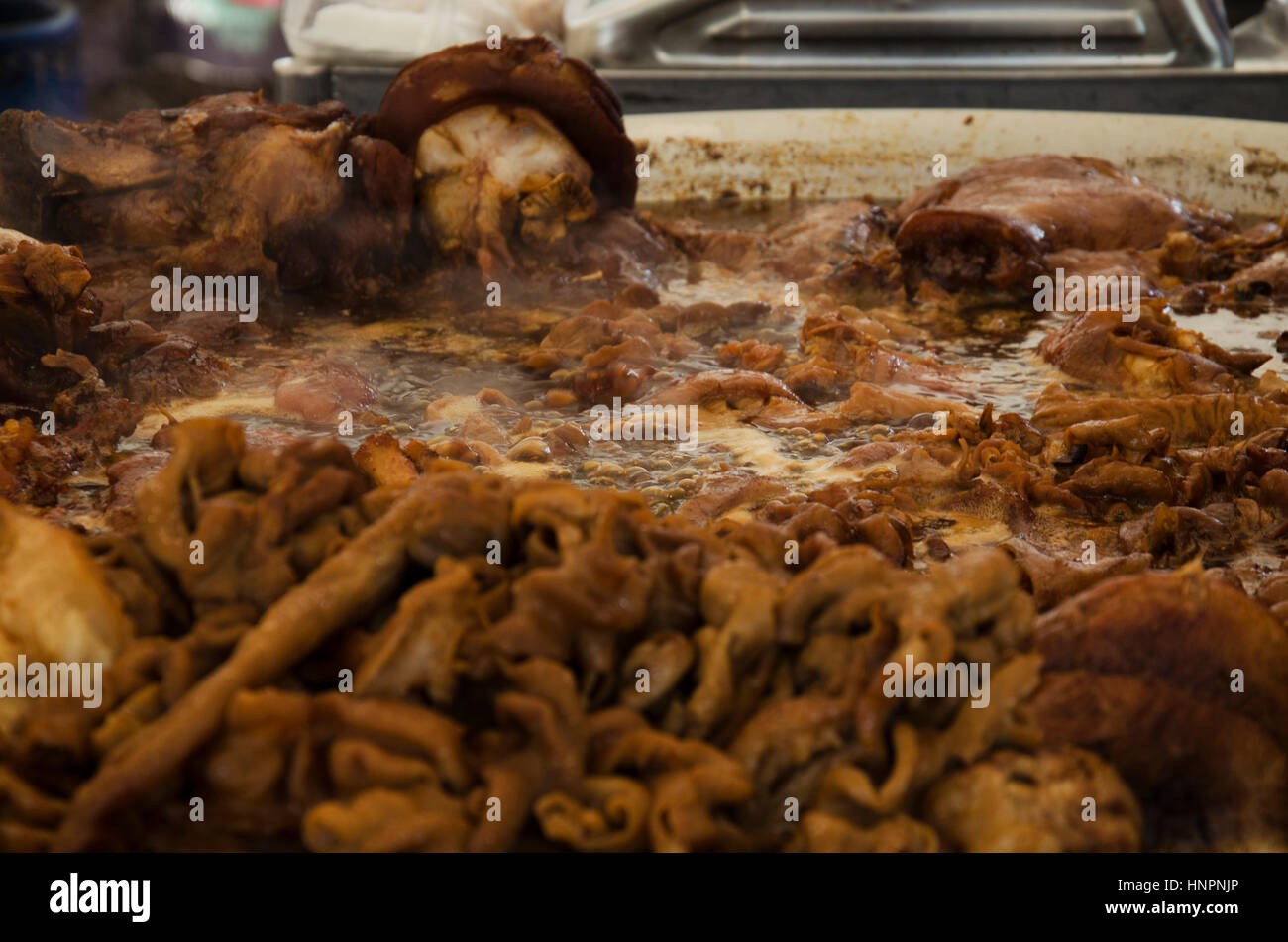 Pork and egg stewed in the gravy or pork and egg in brown sauce frogs ...