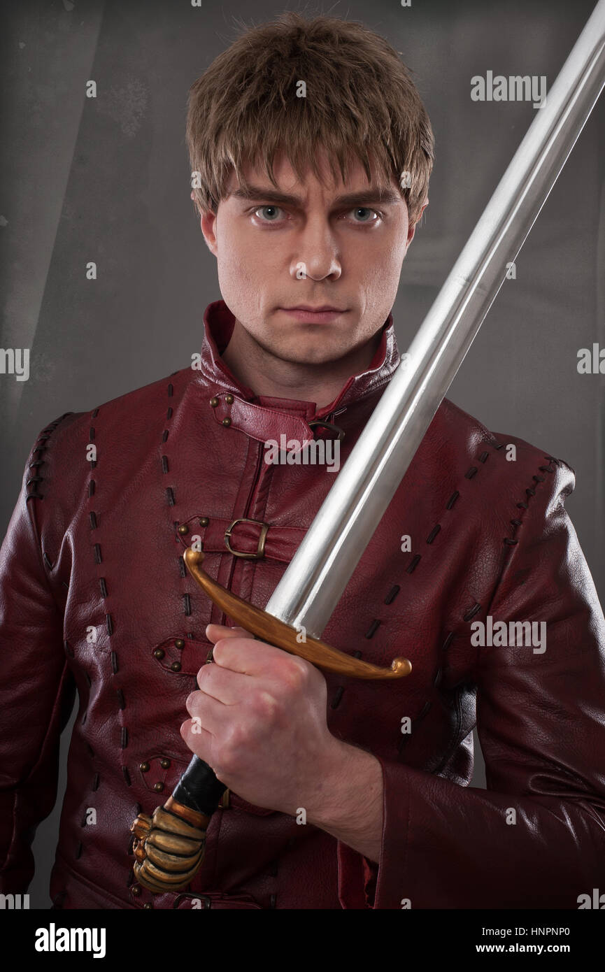 Medieval knight with a sword. Middle age warrior. Studio shoot Stock ...