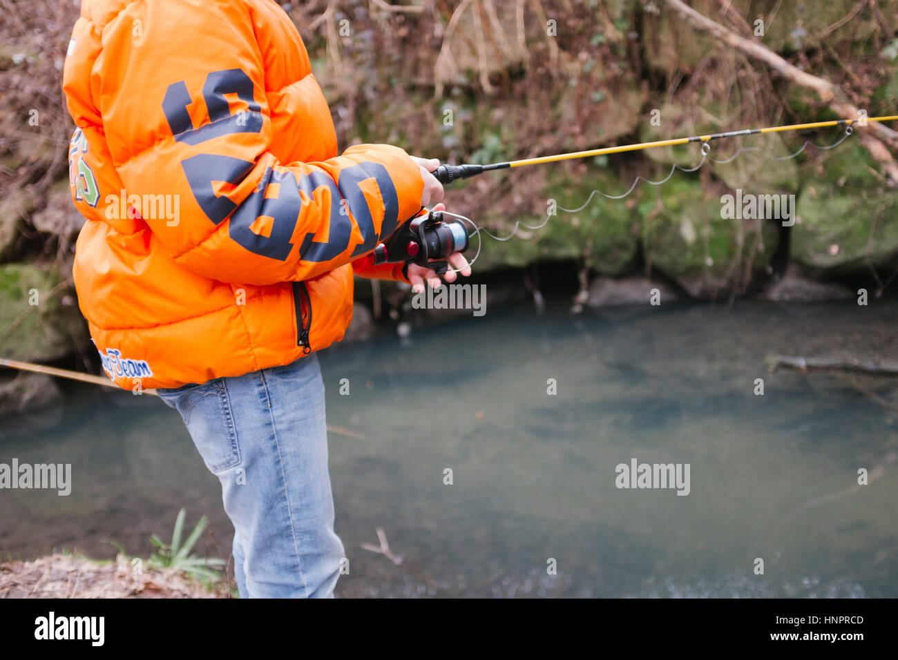 Children fishing on the river Stock Photo - Alamy