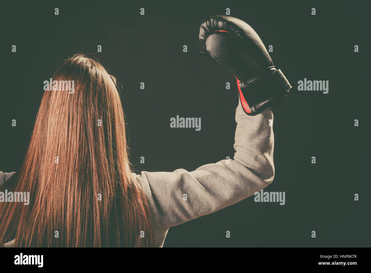 Sportsmanship and strong body. Win fight with opponent. Young woman ...