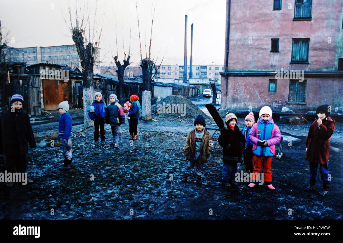Children form the Transylvanian mining town of Petrila in Romania play ...